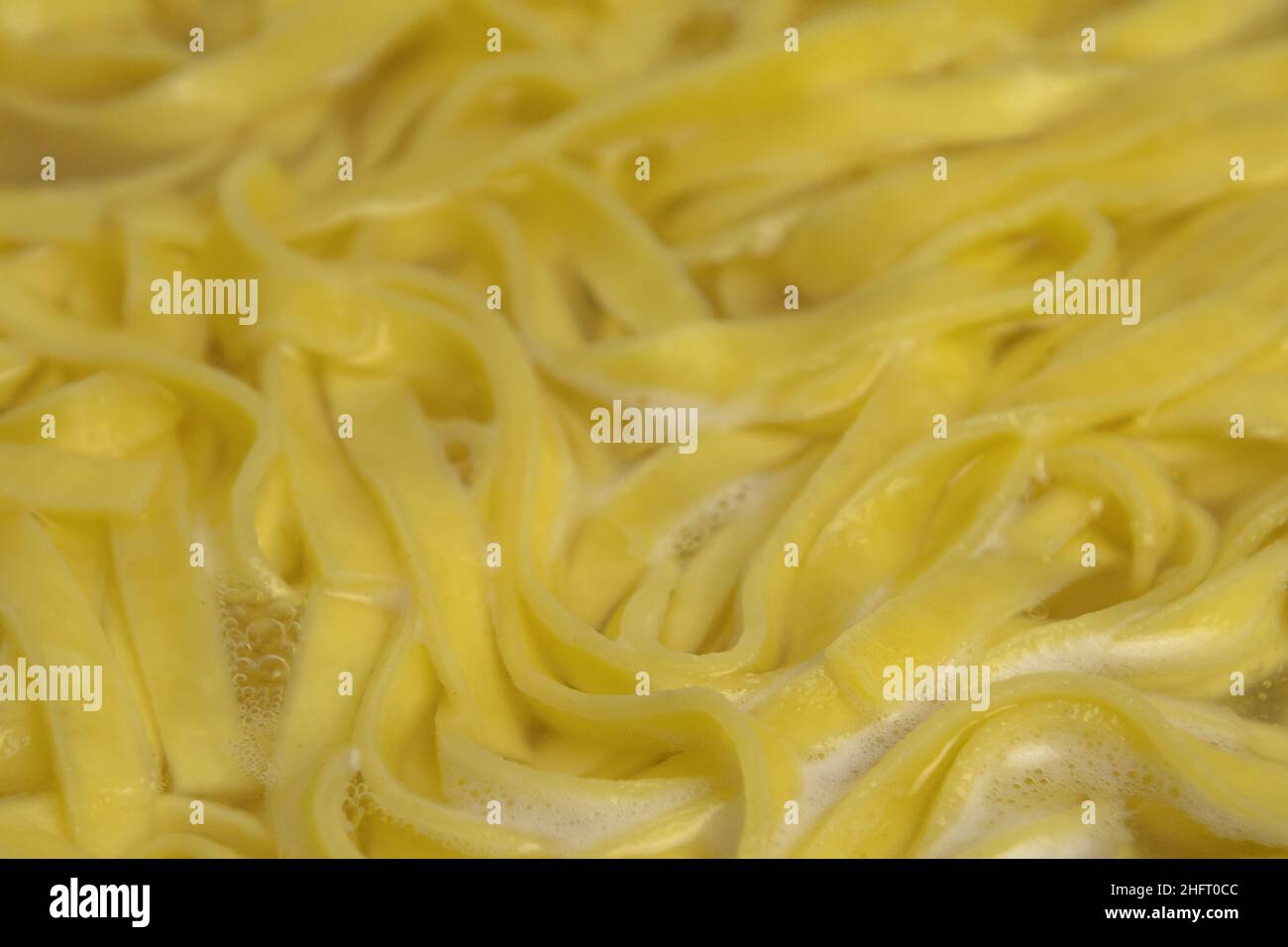 cooking tagliatelle in water Stock Photo - Alamy