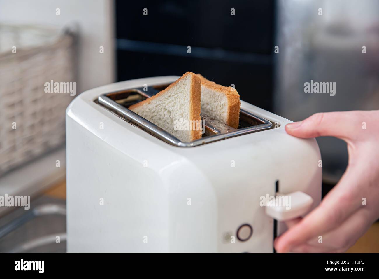 Whole wheat bread in toaster hi-res stock photography and images - Alamy