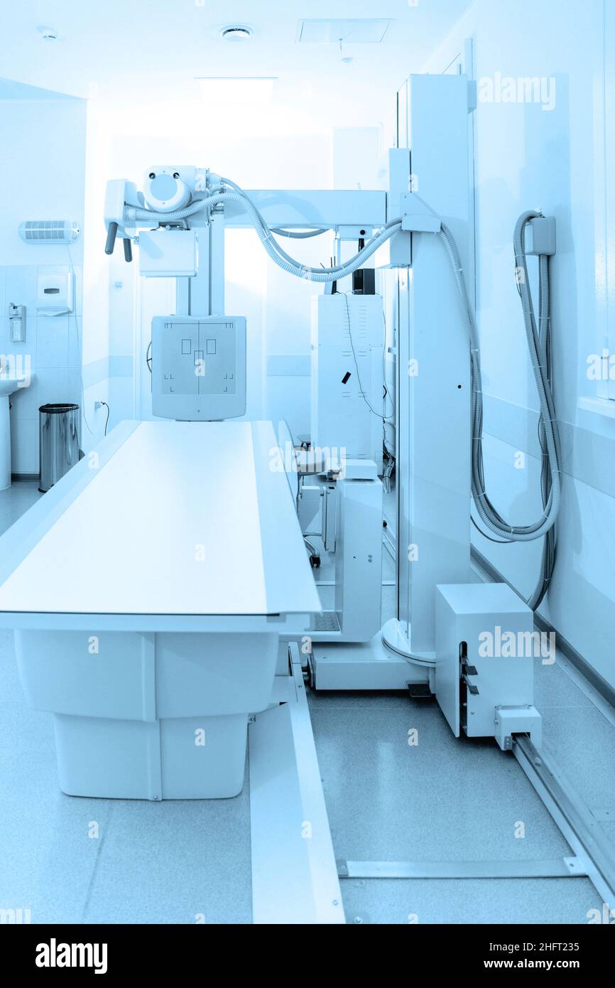 X-ray department in modern hospital. Radiology room with scan machine ...