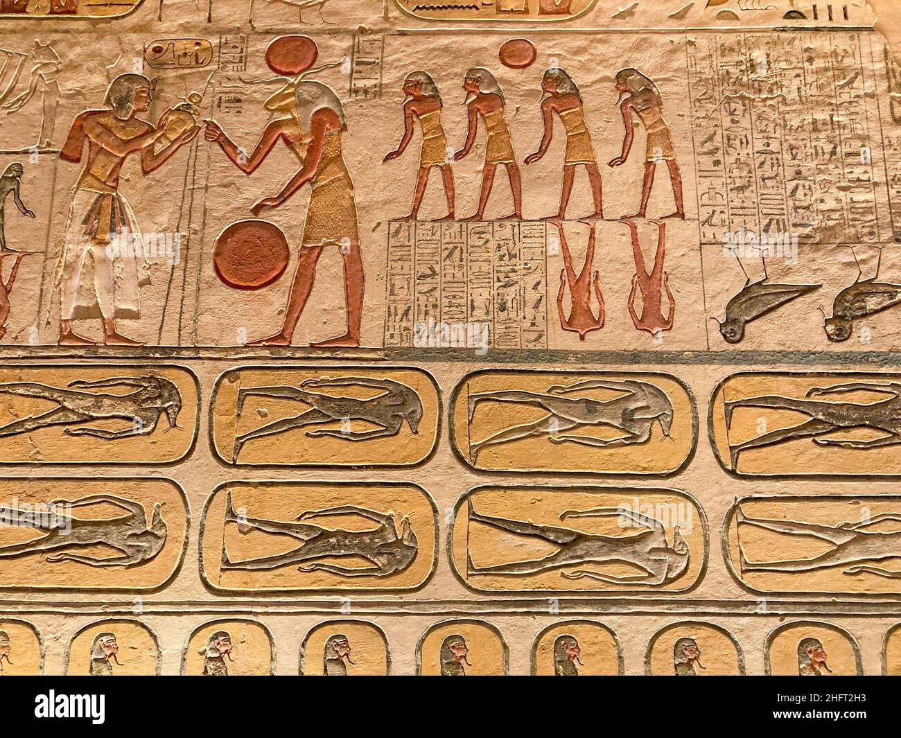 Drawings and hieroglyphs on the walls of the tomb of Ramses IX in the ...