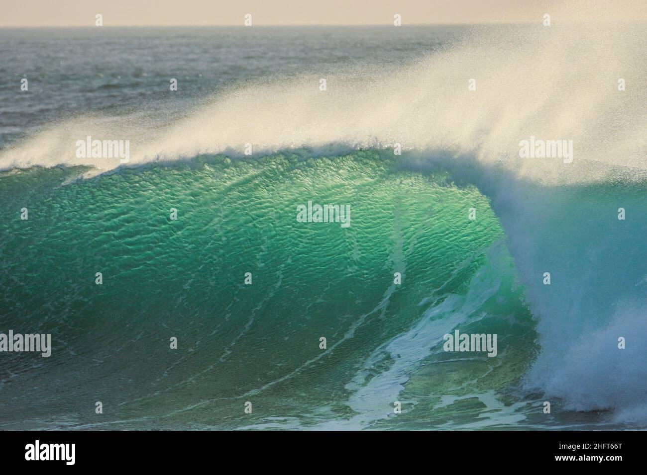 Perfect wave breaking in a beach. Surf spot Stock Photo - Alamy