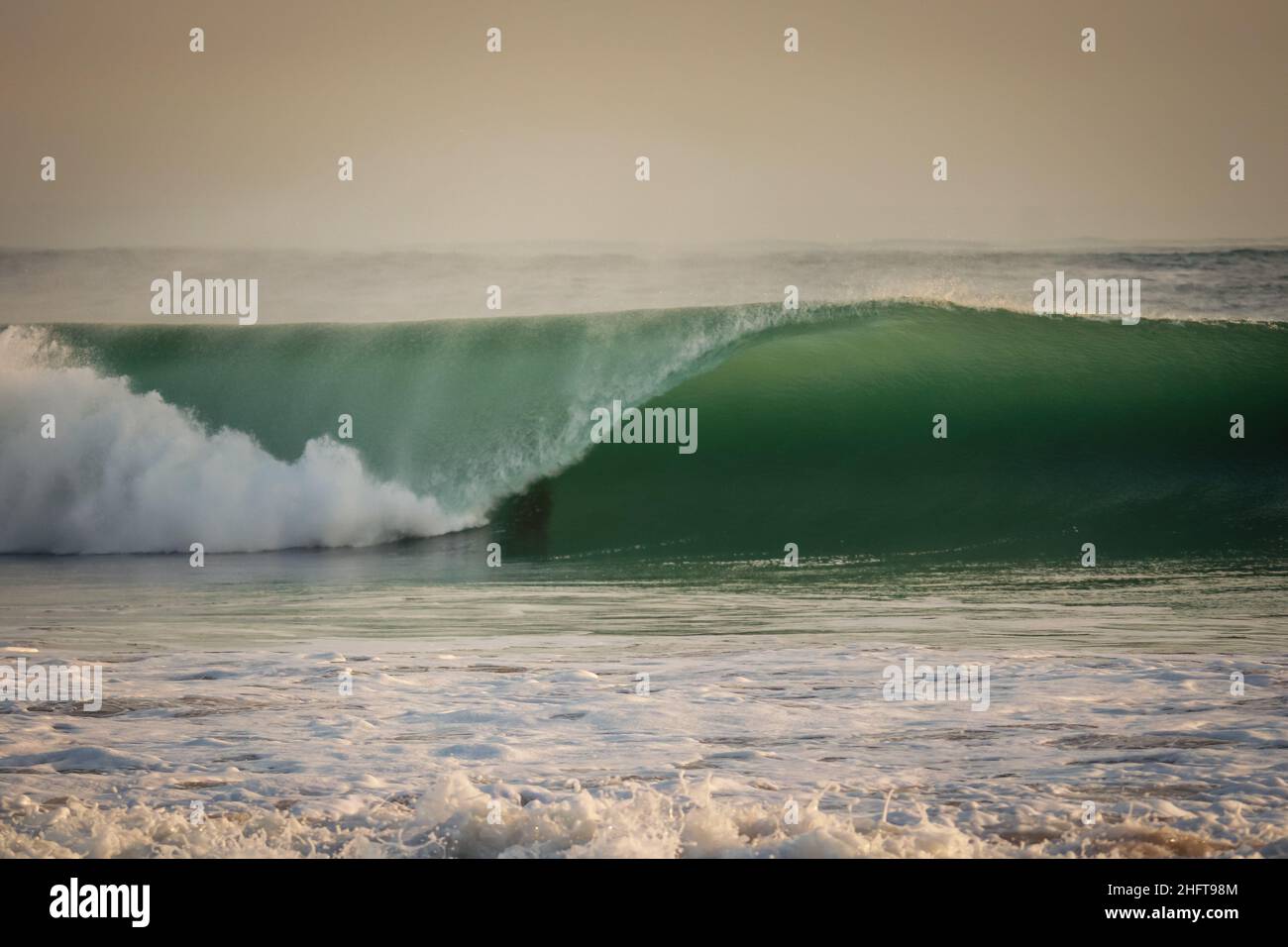 Perfect wave breaking in a beach. Perfect barrel in a surf spot Stock ...