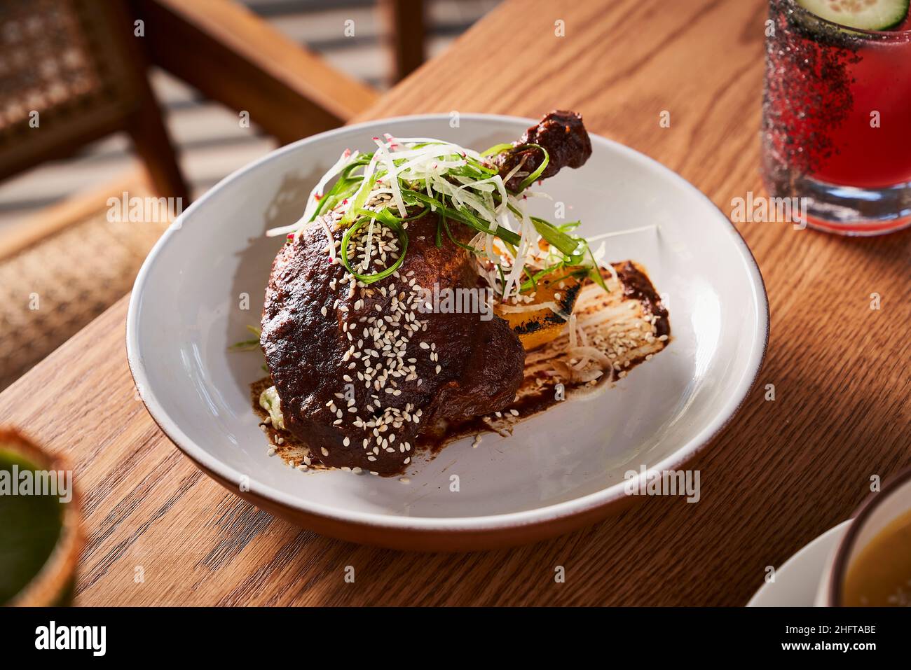 Achiote Rubbed Lamb with roasted vegetables Stock Photo - Alamy