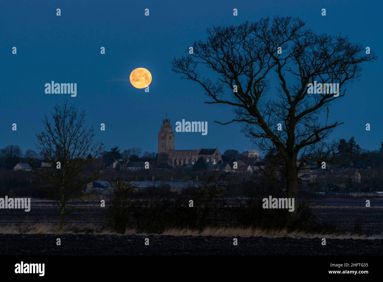 Wolf Moon sets over St Andrew's Church, Sutton-in-the-Isle ...