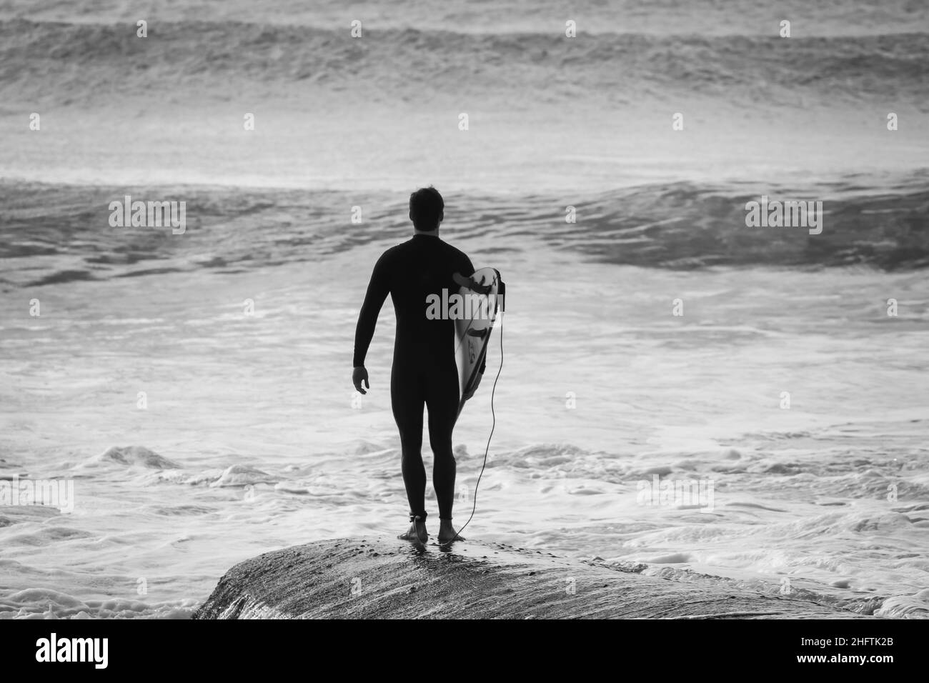 Man in water surfboard Black and White Stock Photos & Images - Alamy
