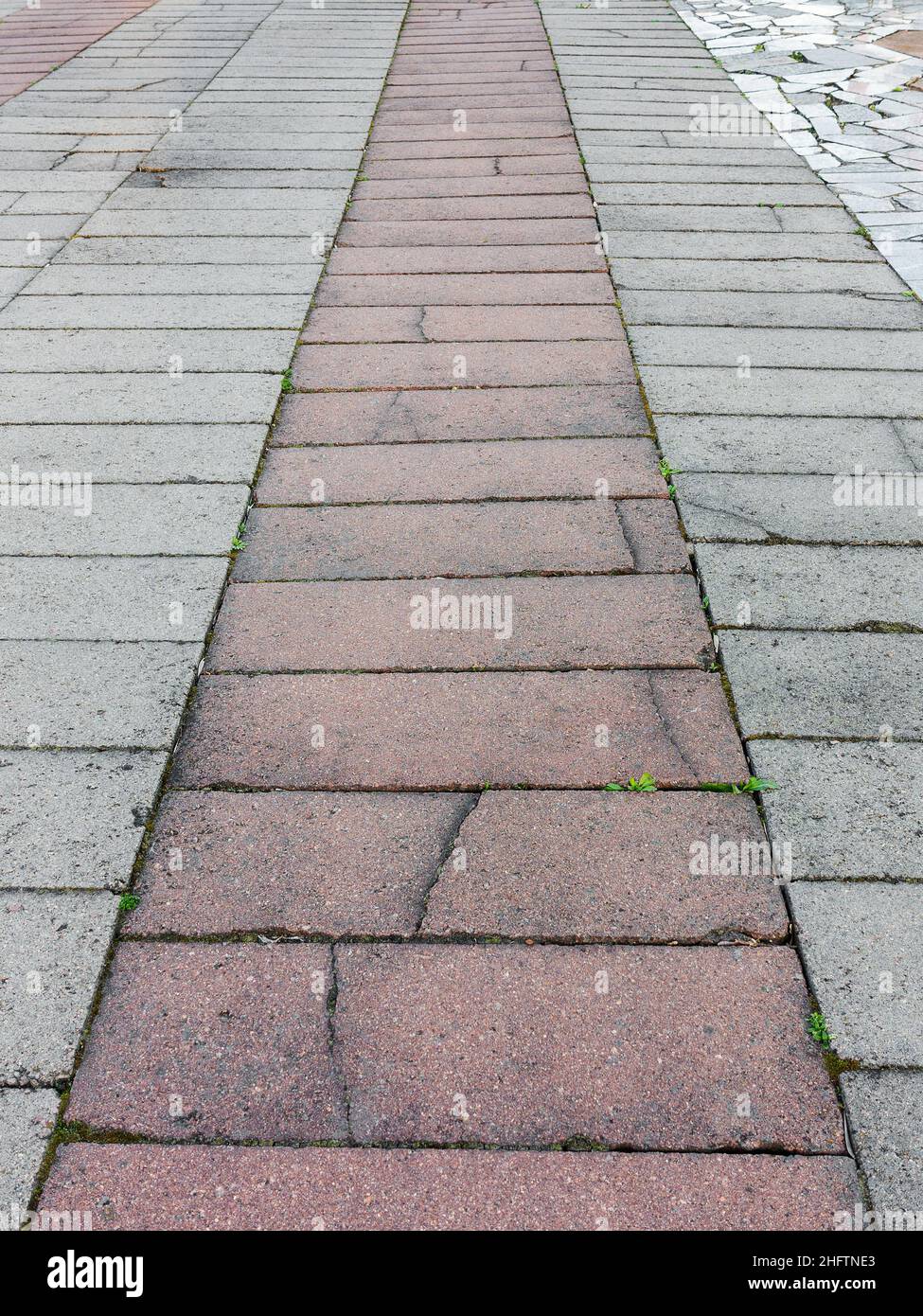Decorative colorful sidewalk pavement. Tiled floor with grey tiles ...