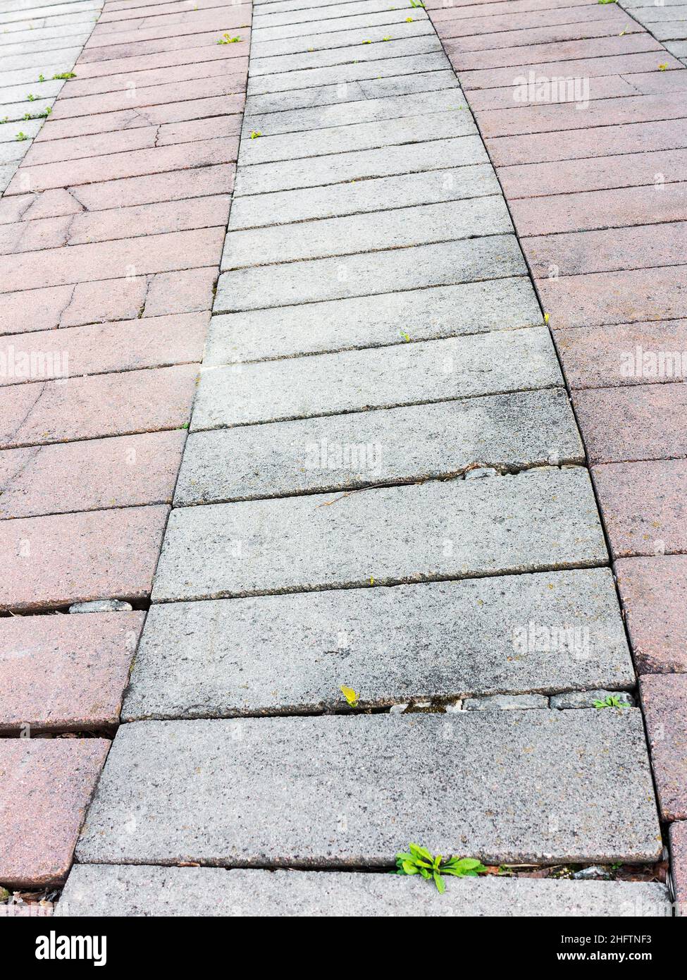 Decorative colorful sidewalk pavement. Tiled floor with grey tiles ...