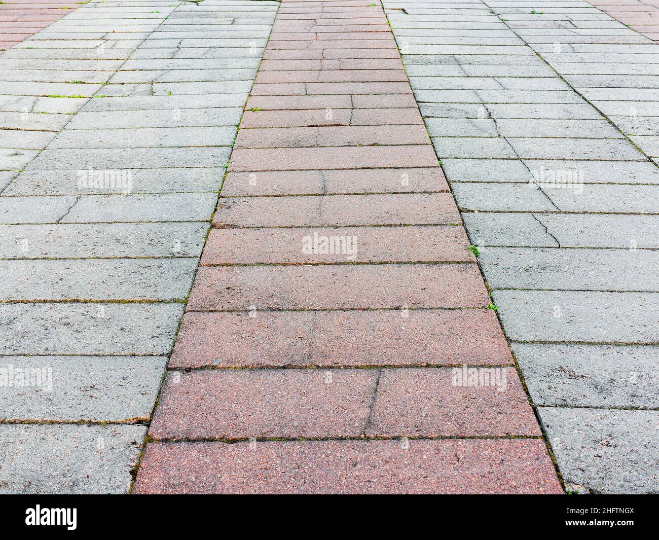 Decorative colorful sidewalk pavement. Tiled floor with grey tiles ...