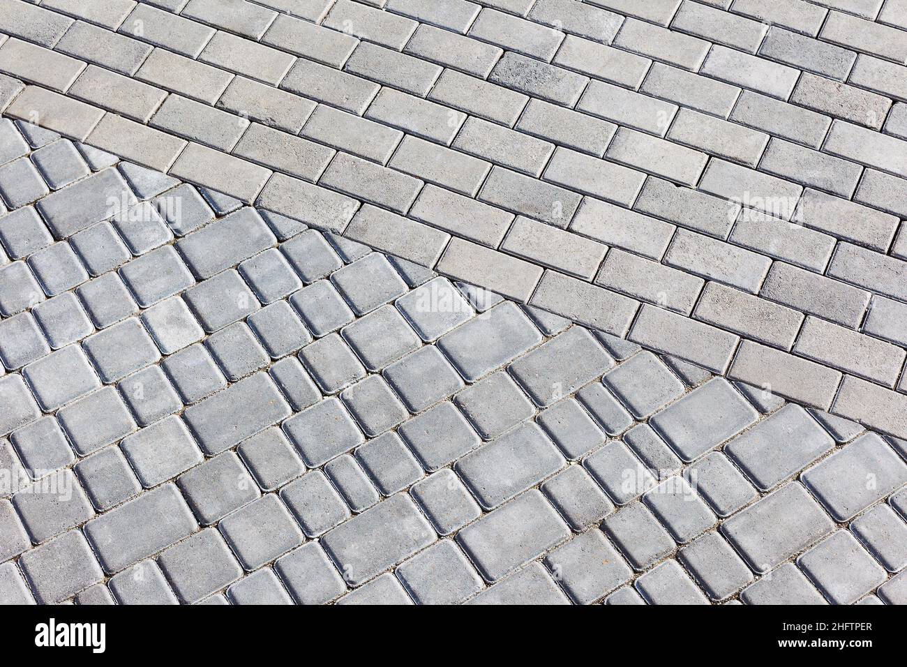 Decorative colorful sidewalk pavement. Tiled floor with grey tiles ...