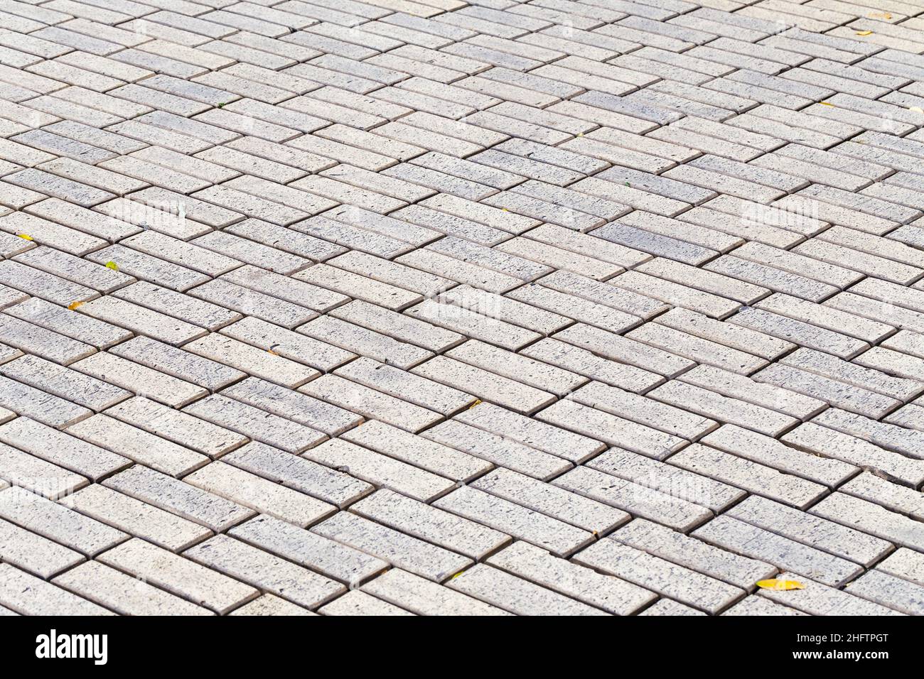 Decorative colorful sidewalk pavement. Tiled floor with grey tiles ...