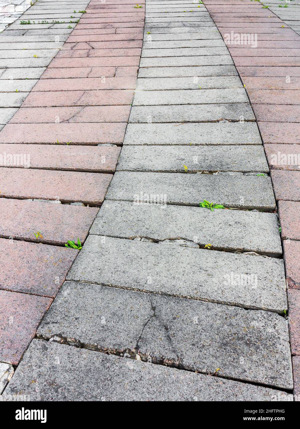 Decorative colorful sidewalk pavement. Tiled floor with grey tiles ...