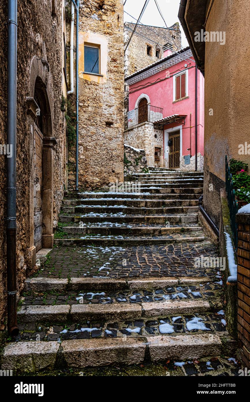 Steps, alleys and snow-covered roofs in the small mountain town of ...