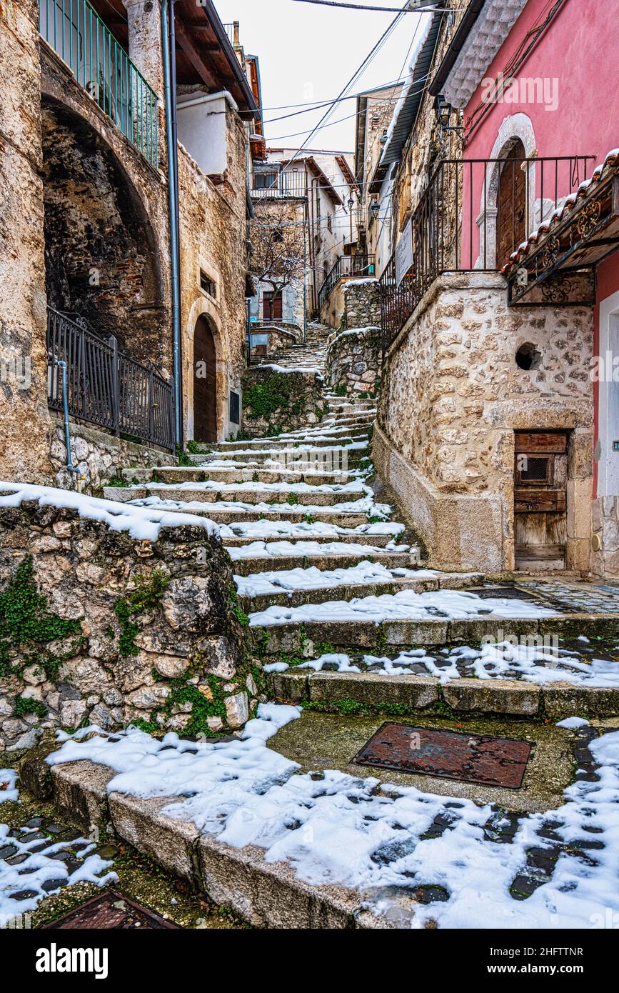 Steps, alleys and snow-covered roofs in the small mountain town of ...
