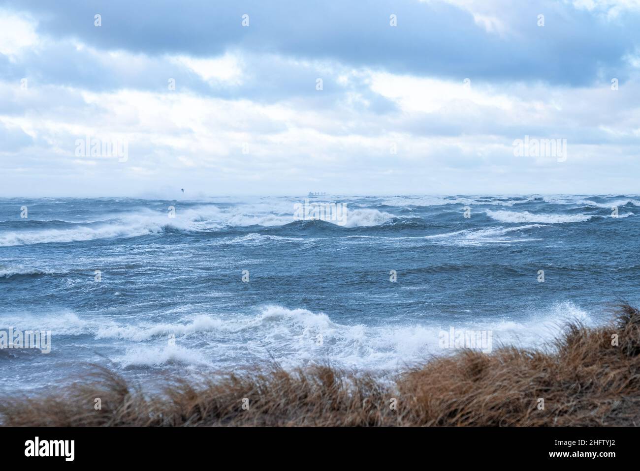 Thunder storm waves crashing on the beach Stock Photo - Alamy
