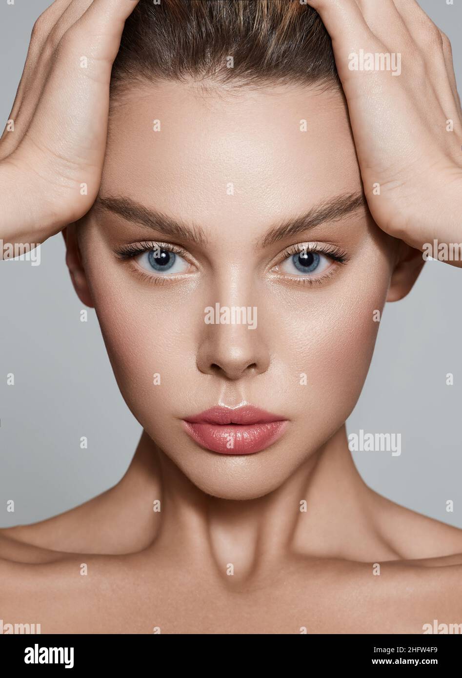 Caucasian woman with healthy moisturized facial skin and natural plump ...