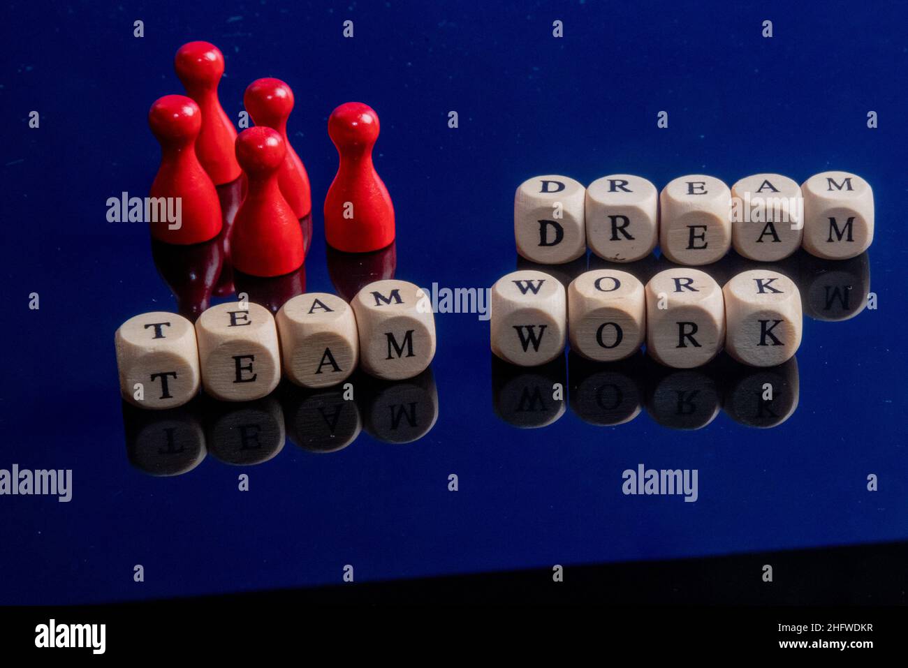 Conceptual image Teamwork, letter cubes form the words Team, Work and ...