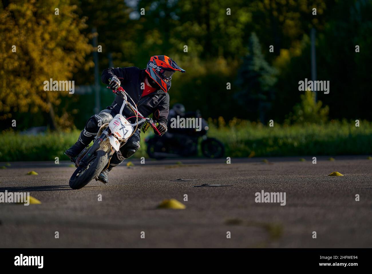 19-09-2021 Riga, Latvia A young man riding a motorcycle on an open road ...