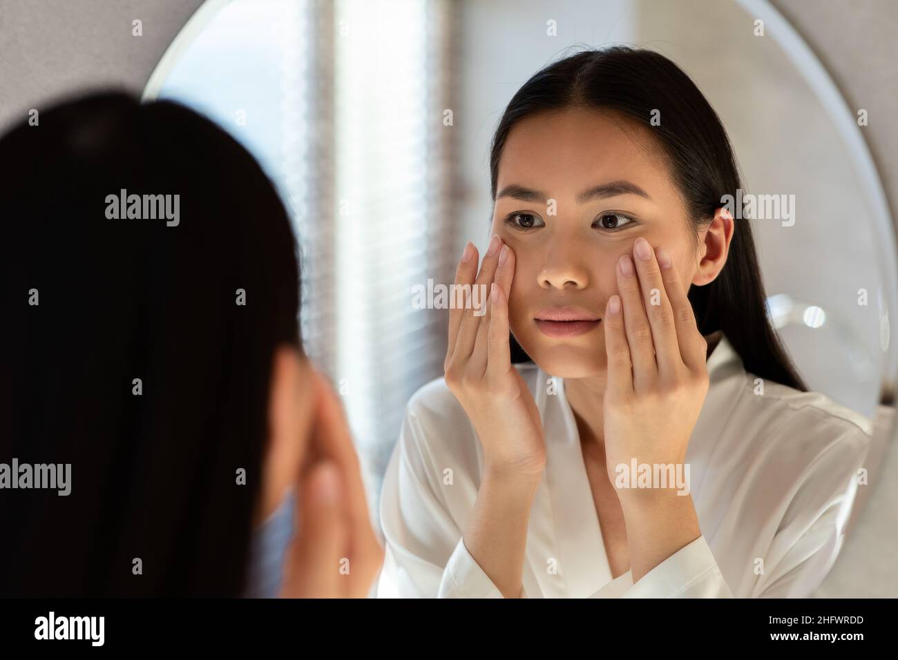 closeup of asian woman feel sad, her skin is oily Stock Photo - Alamy