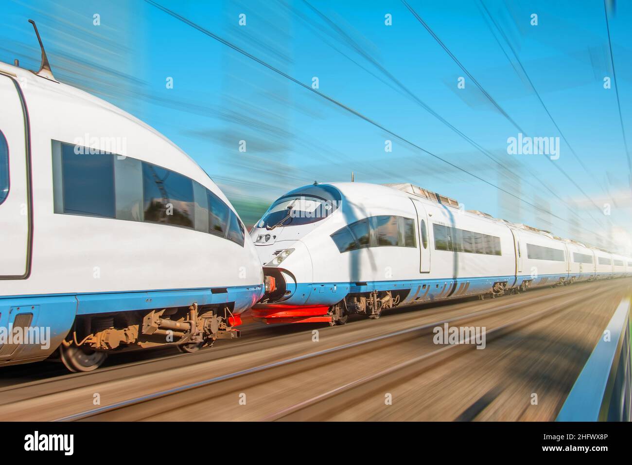 High-speed train double rides at speed in the city at the railway ...
