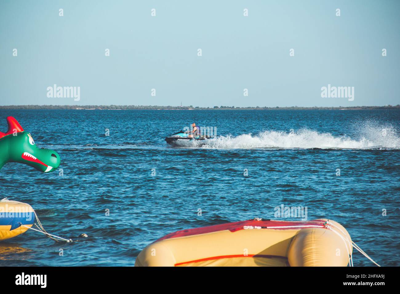 Primorsk, Ukraine - August 31, 2021: A man on a jet ski rides on the ...