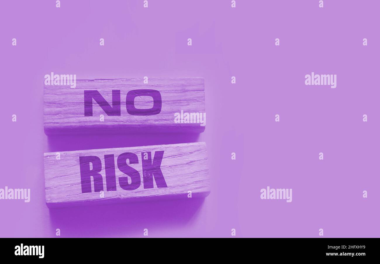No Risk words on wooden blocks on yellow background. Risk management ...