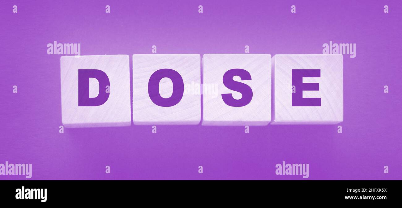 Wooden blocks with the word Dose. Medical concept Stock Photo - Alamy