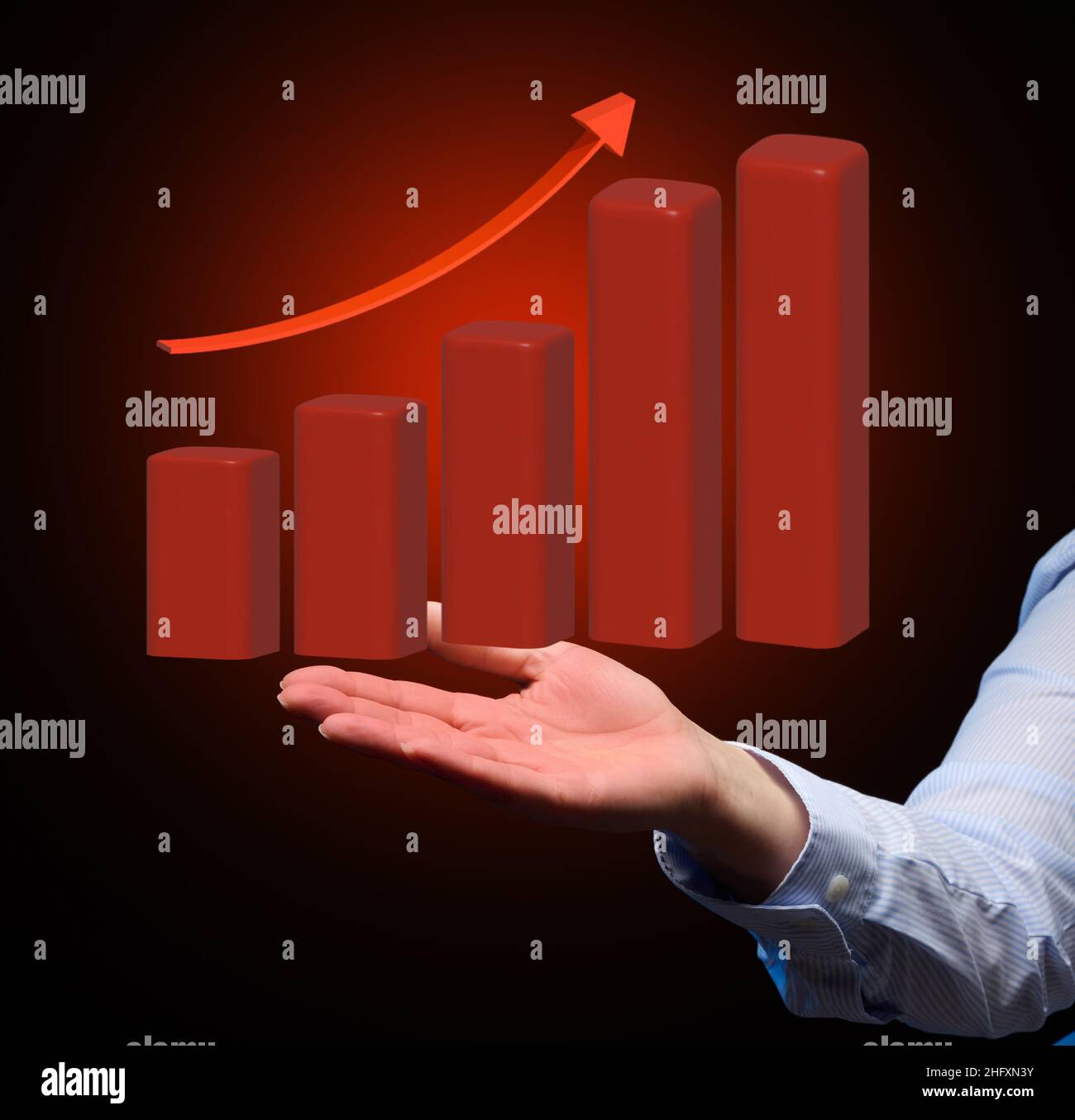 growing graph from red cubes and a woman's hand. The concept of ...