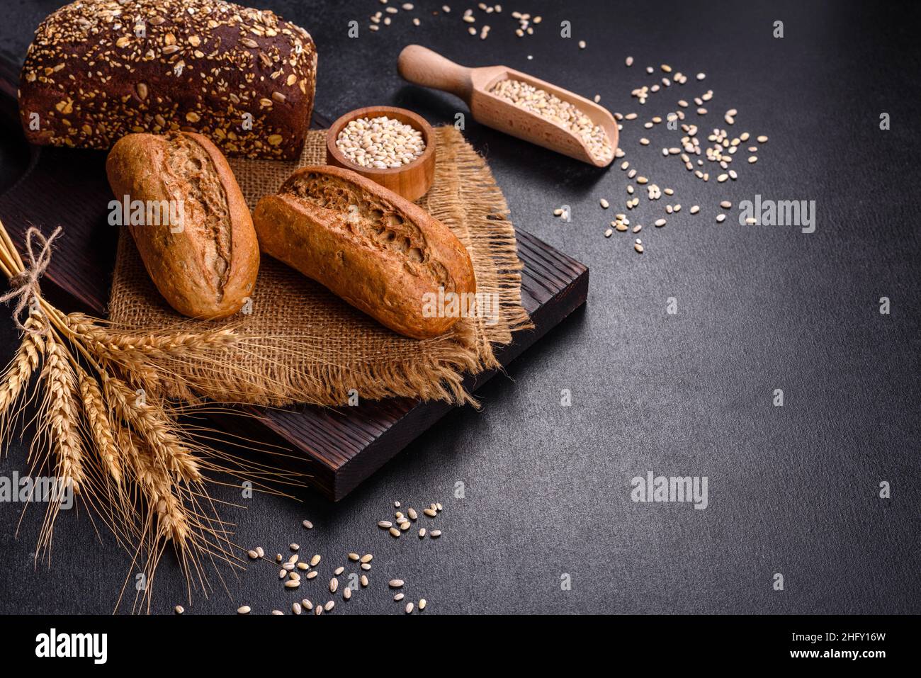 Fresh Bread on black background, top view, copy space. Homemade fresh ...