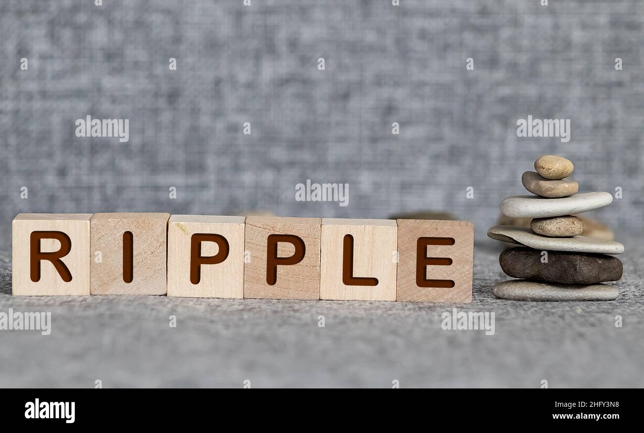 Word RIPPLE formed by alphabet blocks on mother cryptocurrency Stock ...