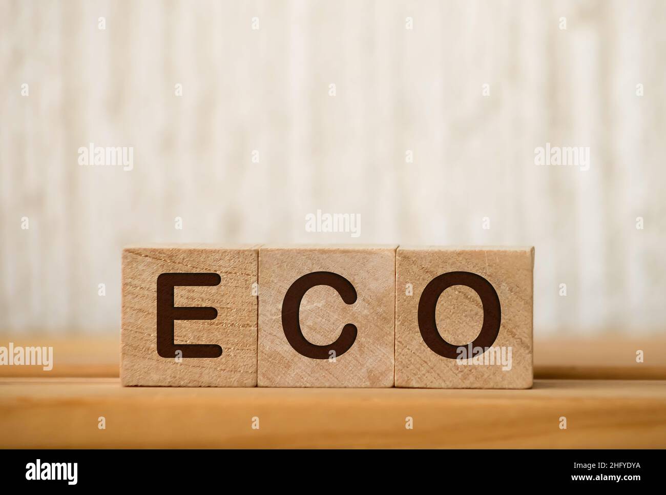 Eco word written on wood block. Eco friendly and sustainable ...