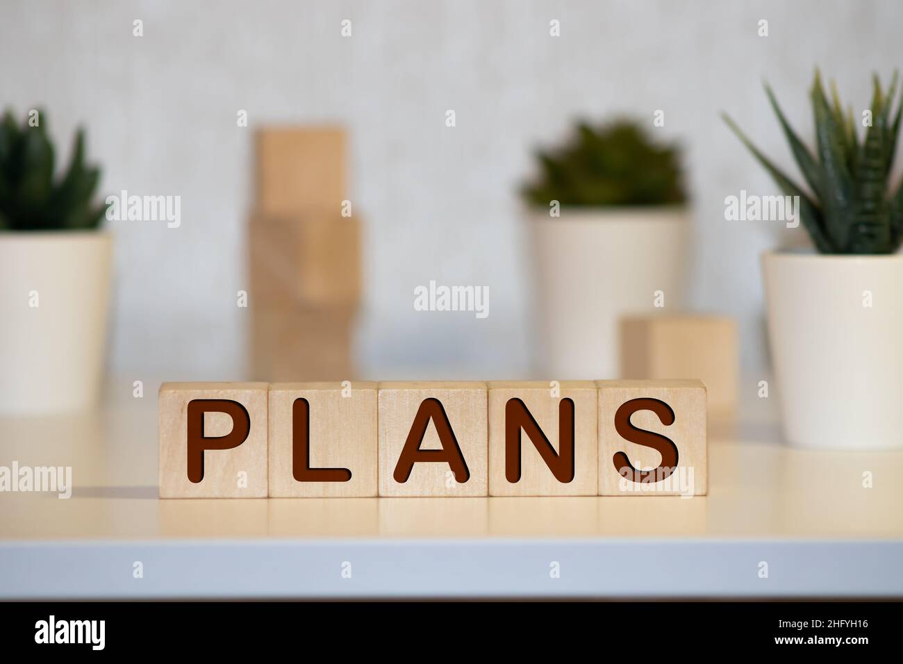 Plans word on table background. business concept Stock Photo - Alamy