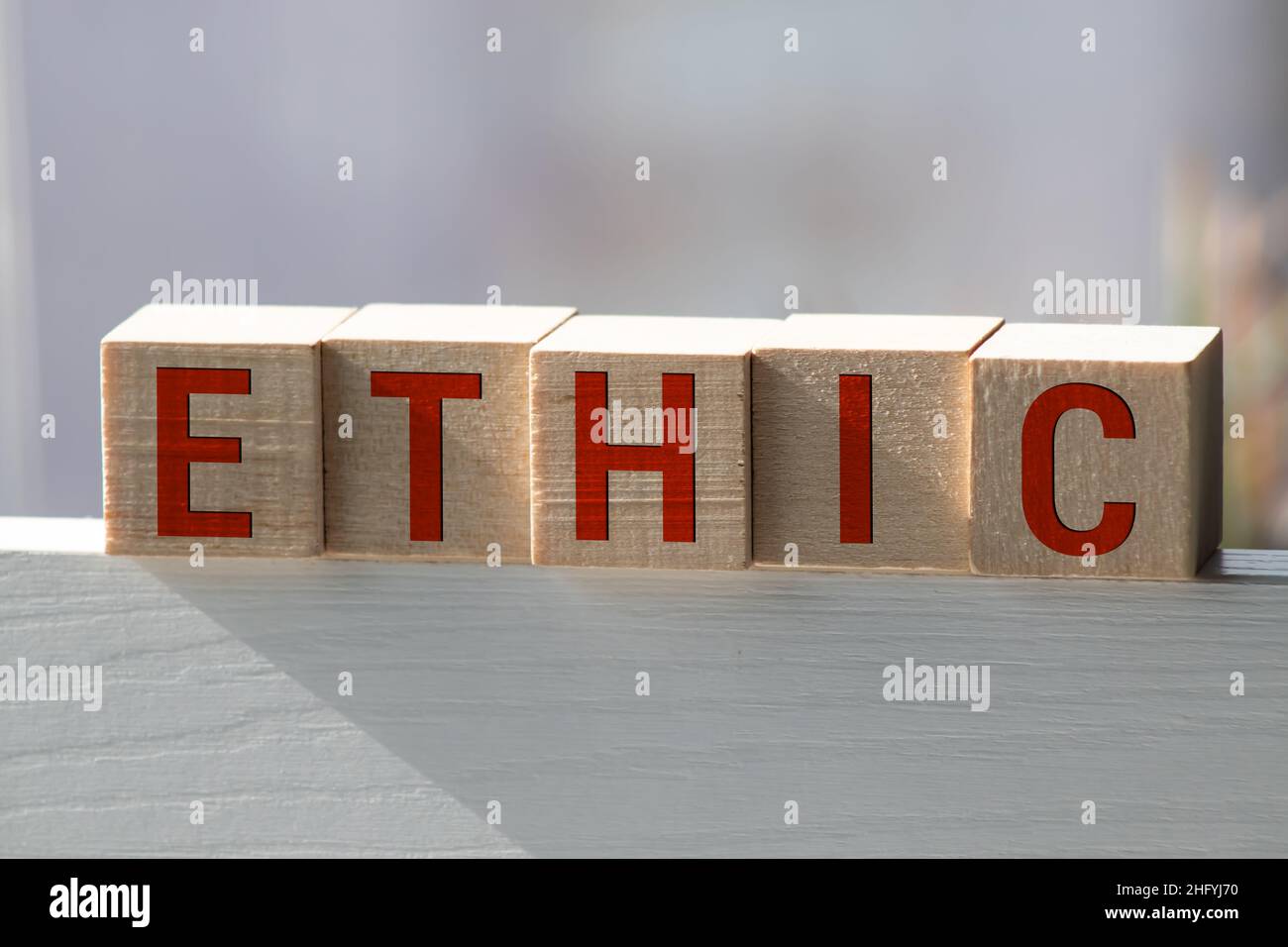 Wooden blocks with the word Ethic. Defending, systematizing and ...
