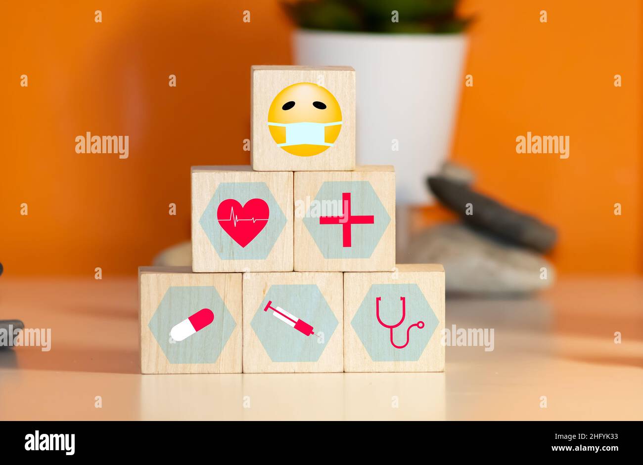 Medical symbols on wooden blocks. Medical and pharmaceutical concept ...