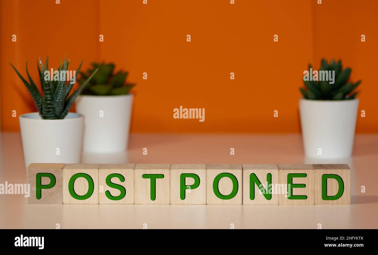Postpone word hi-res stock photography and images - Alamy
