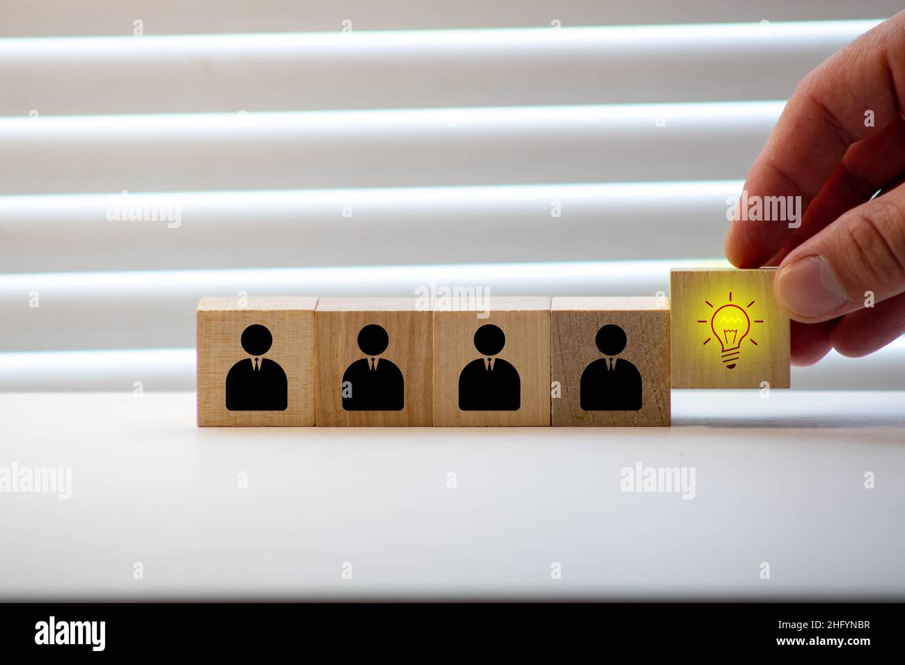 Hand top on pyramid hi-res stock photography and images - Alamy