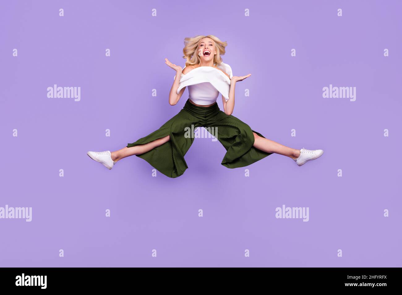 Full length body size photo girl jumping high careless in stylish ...