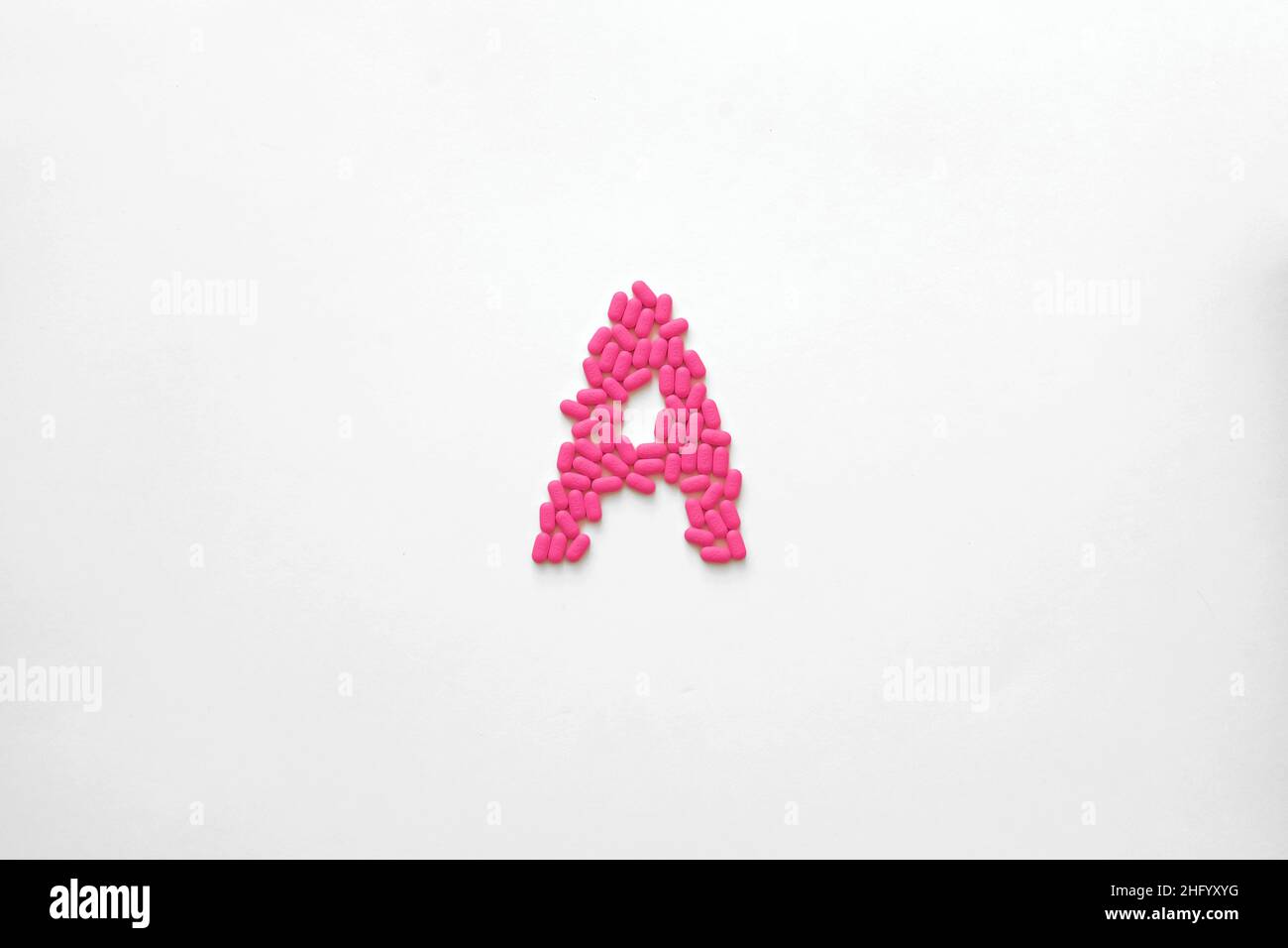 Diphenhydramine Hydrochloride pills with imprint 25 L479 on a white ...