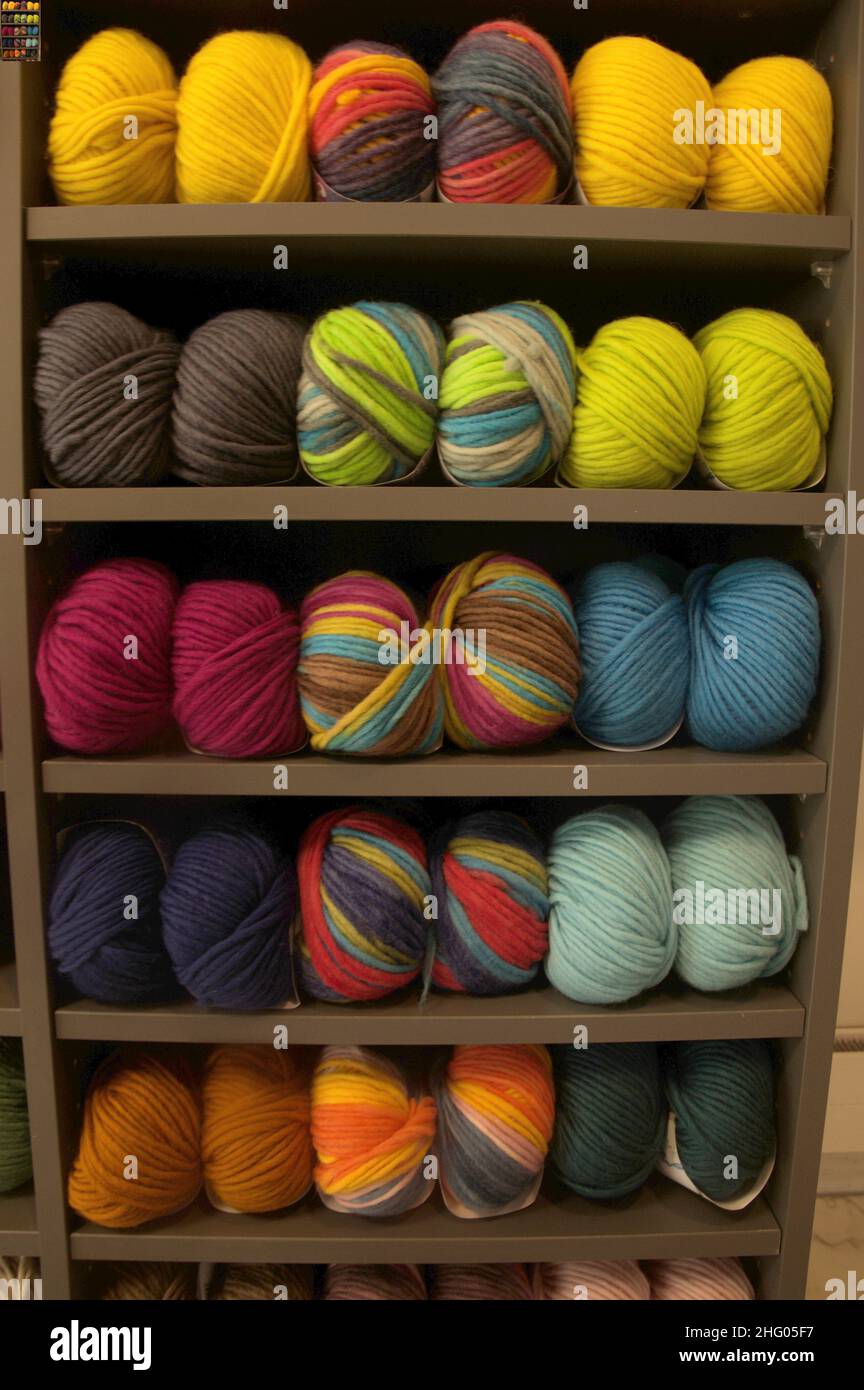 Colourful balls of wool on shelves Stock Photo - Alamy