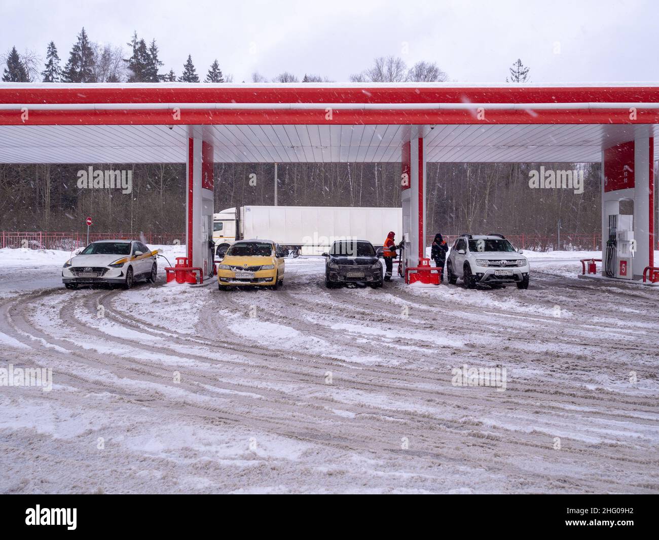 Moscow region. Russia. January 15, 2022. Cars at a gas station on a ...
