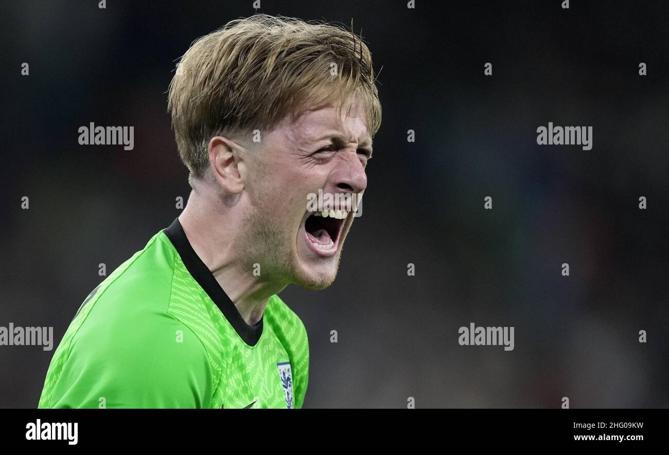 England's goalkeeper Jordan Pickford reacts during the penalty shootout ...