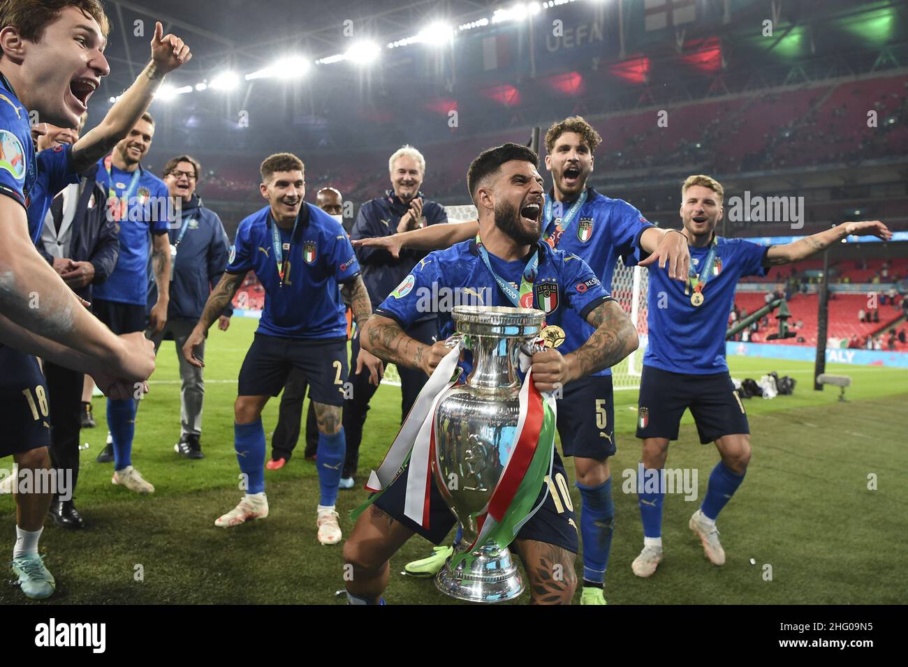 Italy's Lorenzo Insigne celebrates holds the trophy after the final of ...
