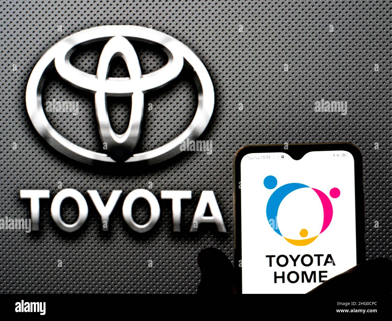 In this photo illustration, the Toyota Home logo is seen displayed on a ...