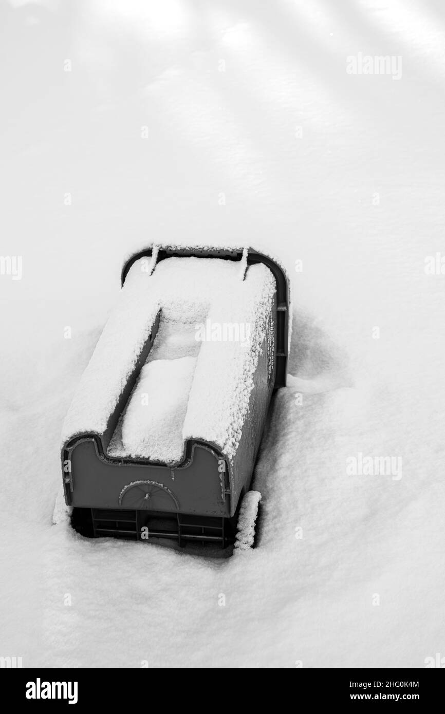 Garbage in trash bin on Black and White Stock Photos & Images - Alamy