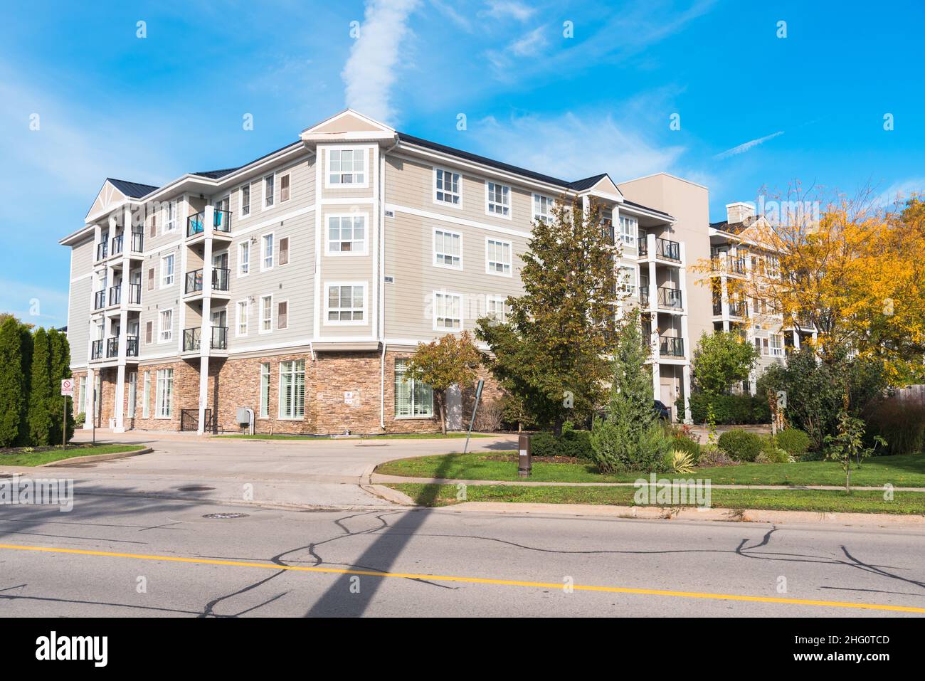 Modern apartment building on a clear autumn morning Stock Photo - Alamy