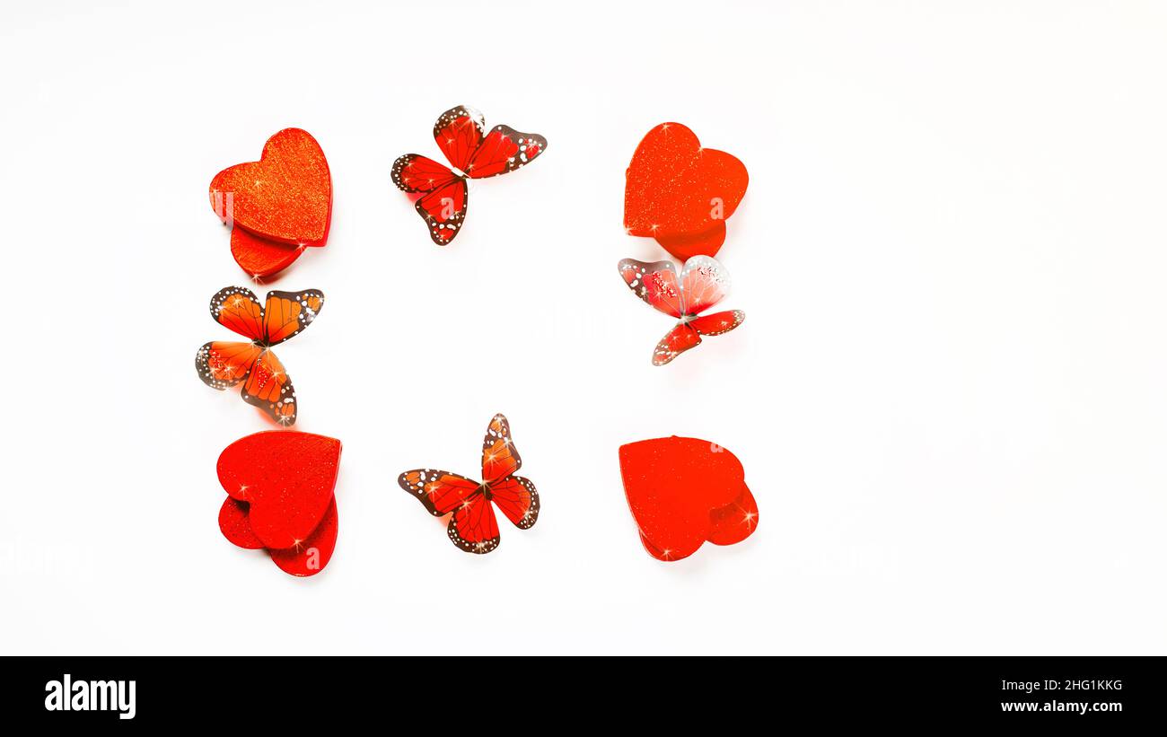 Valentine s day concept.Red hearts with butterflies on a white ...