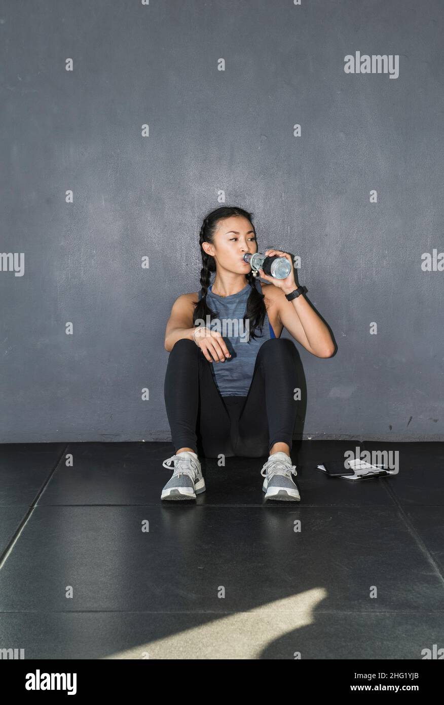 woman resting at gym in Bangkok Stock Photo - Alamy