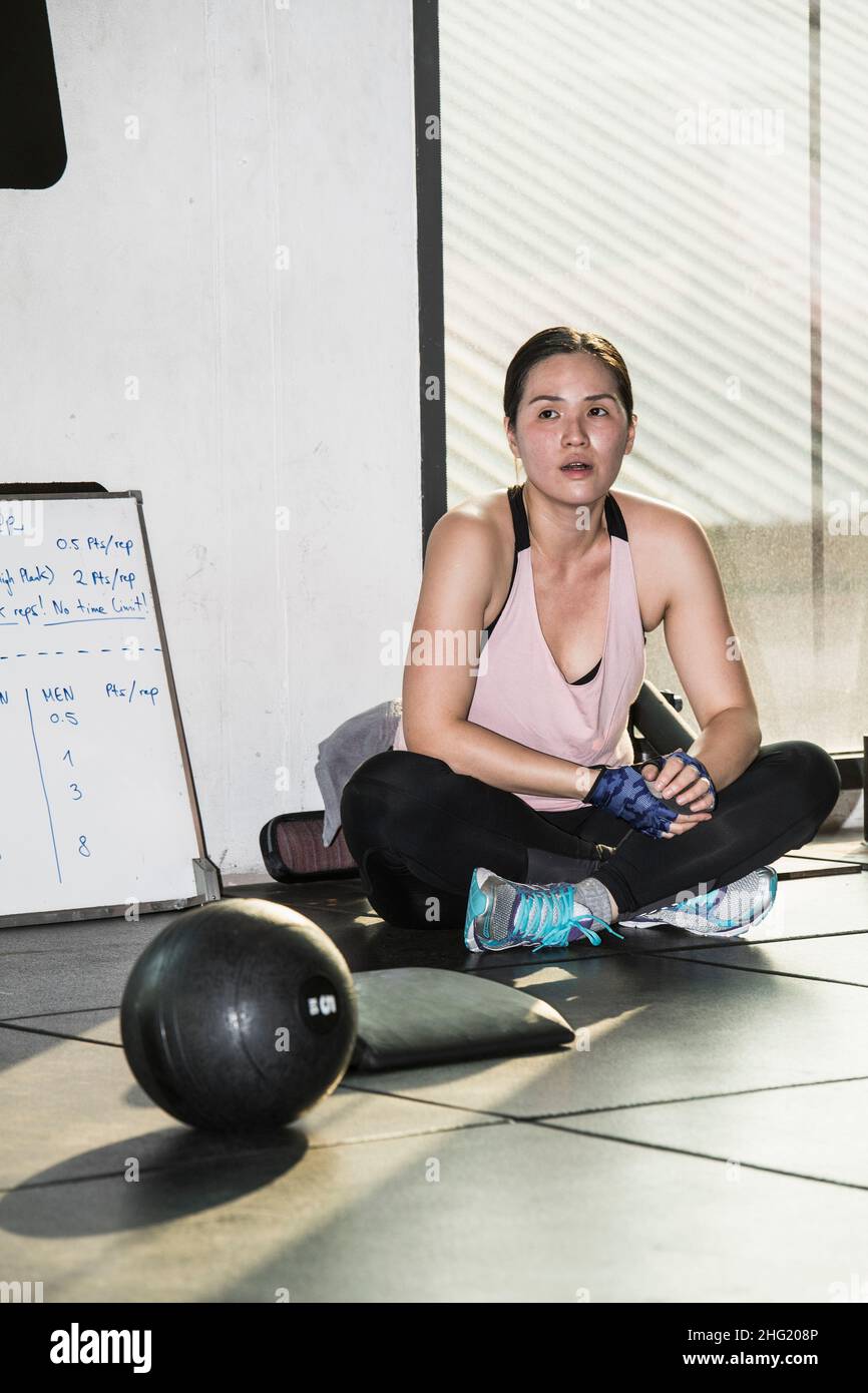 Exhausted asian woman having hi-res stock photography and images - Alamy