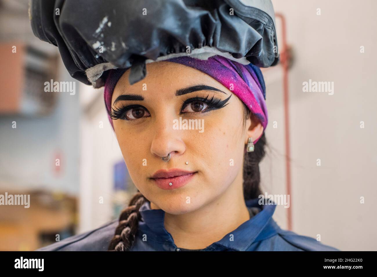 Female Auto worker portrait at work Stock Photo - Alamy