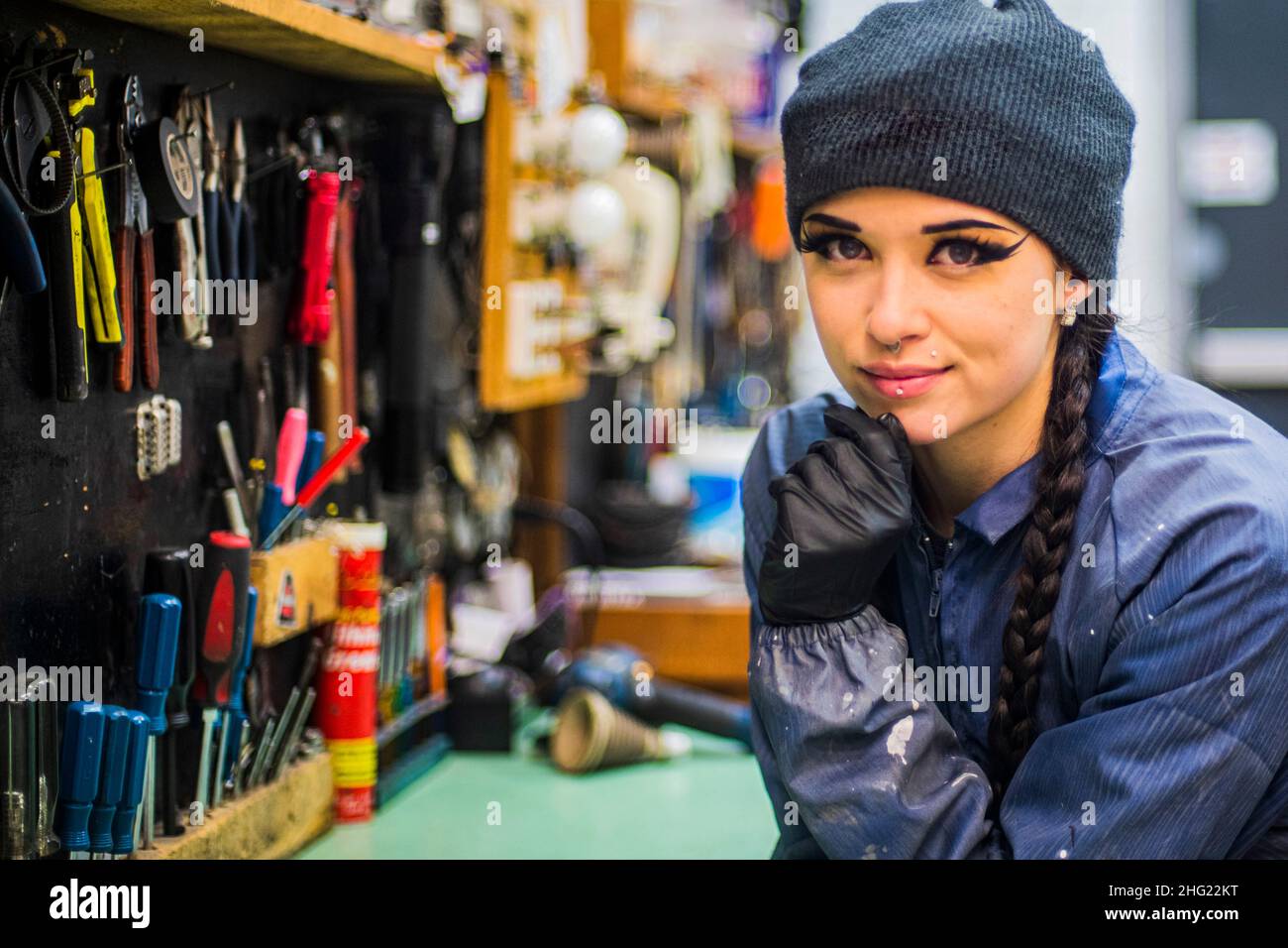 Female Auto worker portrait at work station Stock Photo - Alamy