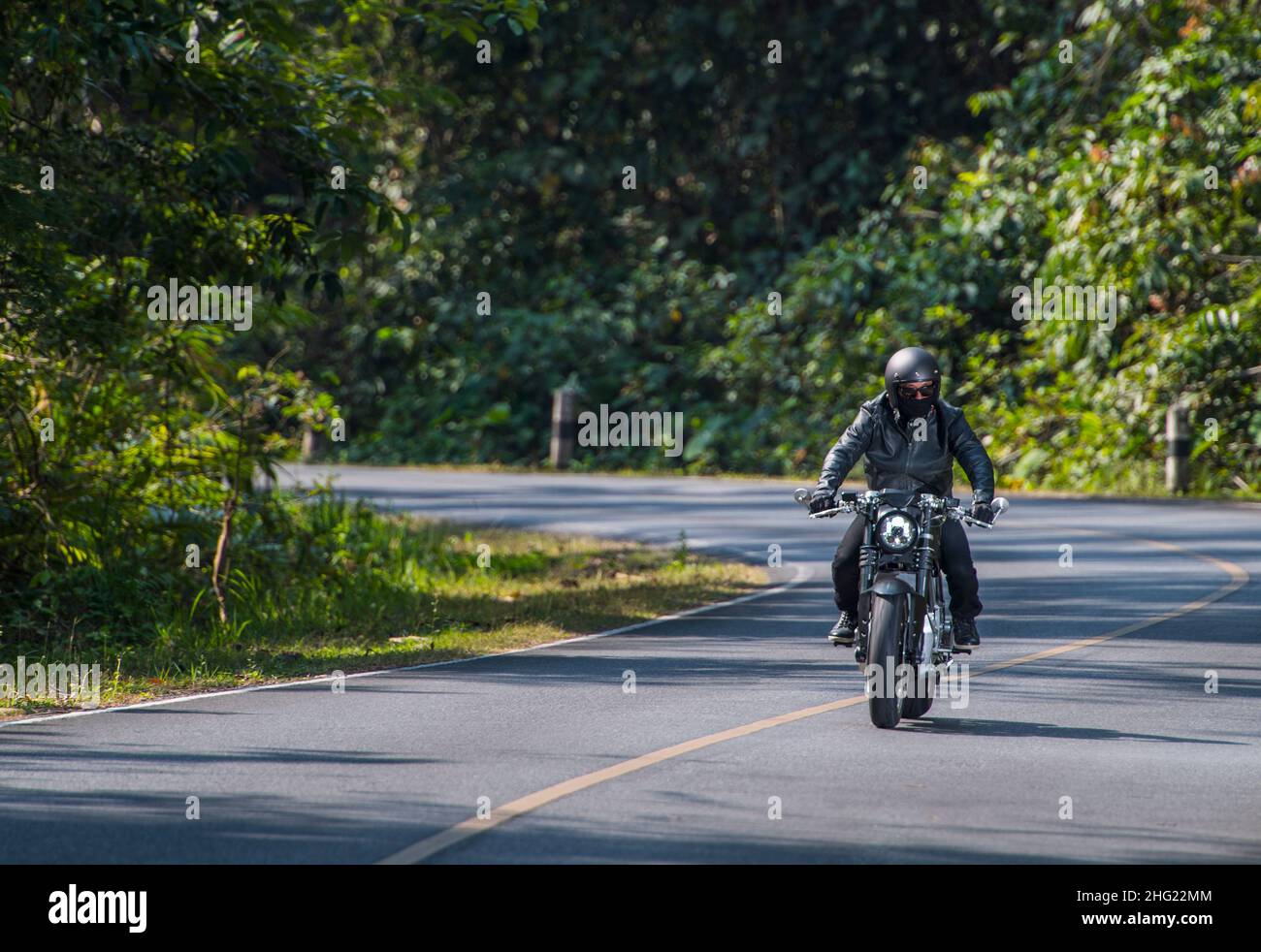 Man riding cafe racer motorcycle hi-res stock photography and images ...